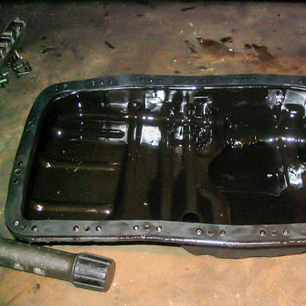 BMW oil pan sump gasket replacement costs repairs AutoGuru